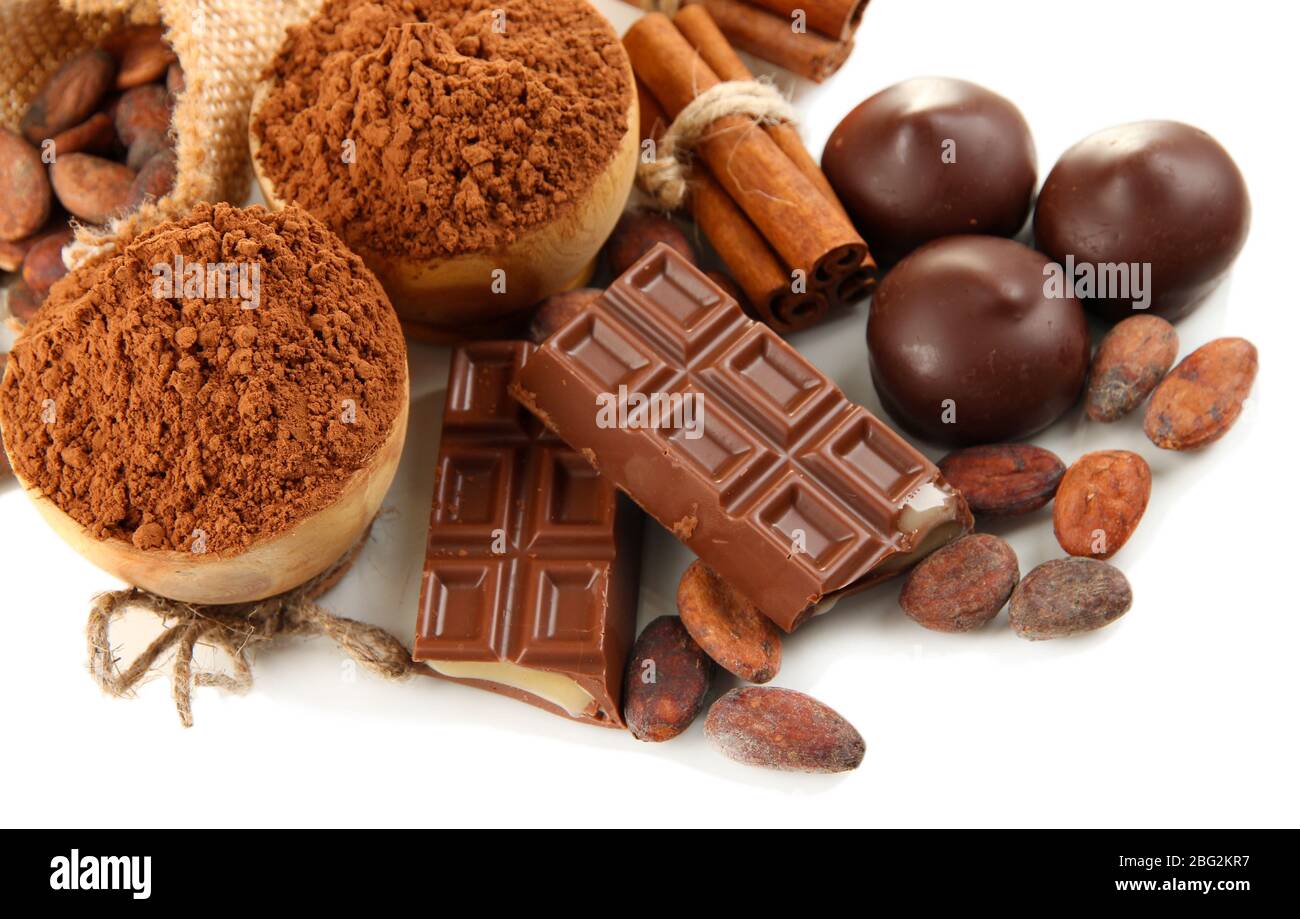 Composition of chocolate sweets, cocoa and spices, isolated on white ...