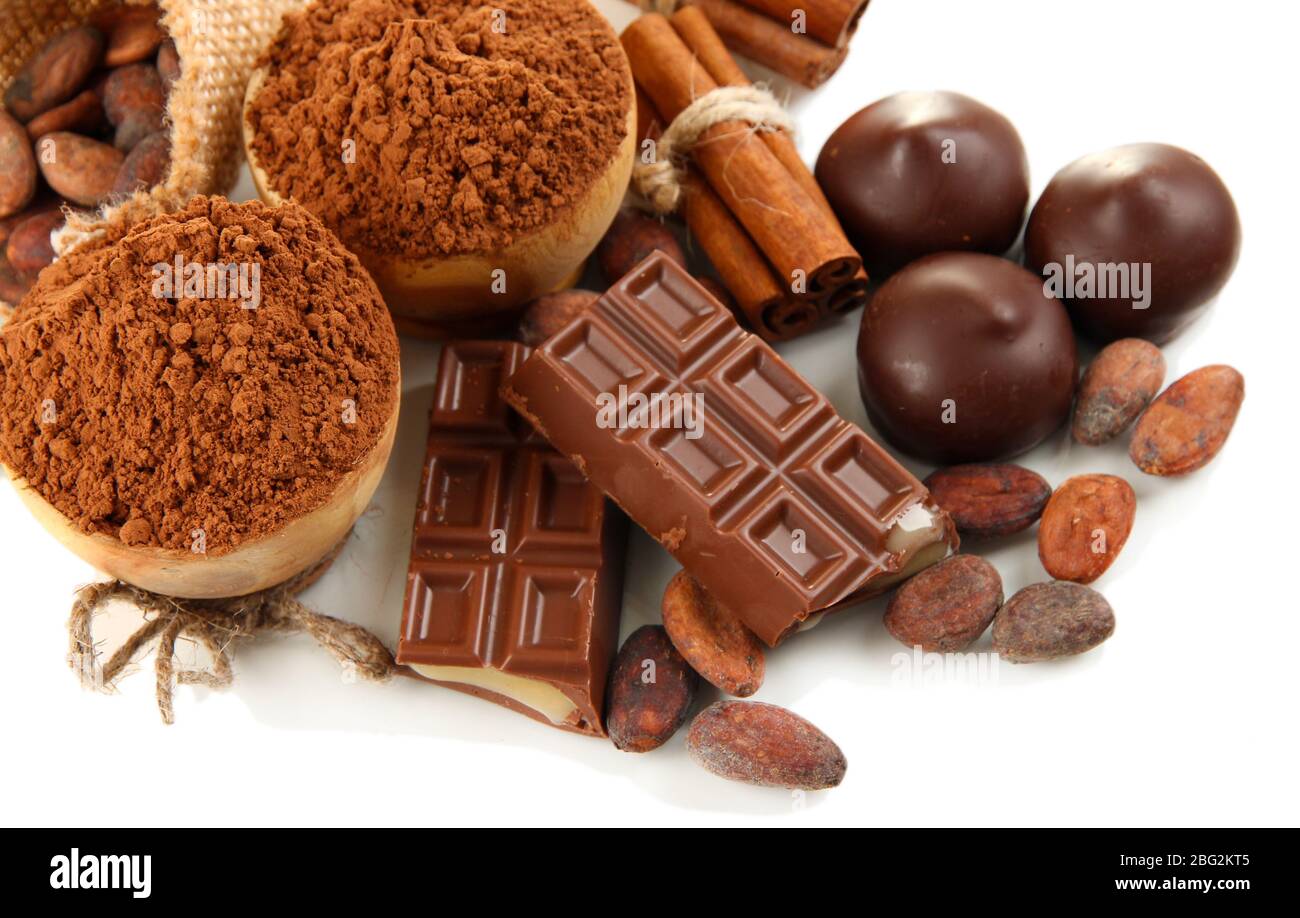 Composition of chocolate sweets, cocoa and spices, isolated on white ...