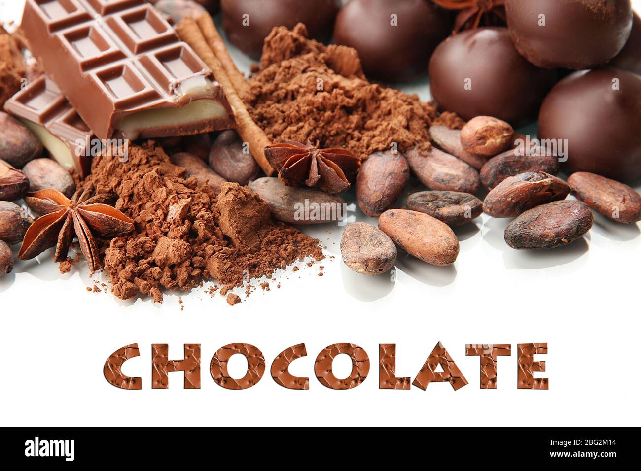 Composition of chocolate sweets, cocoa and spices, isolated on white ...
