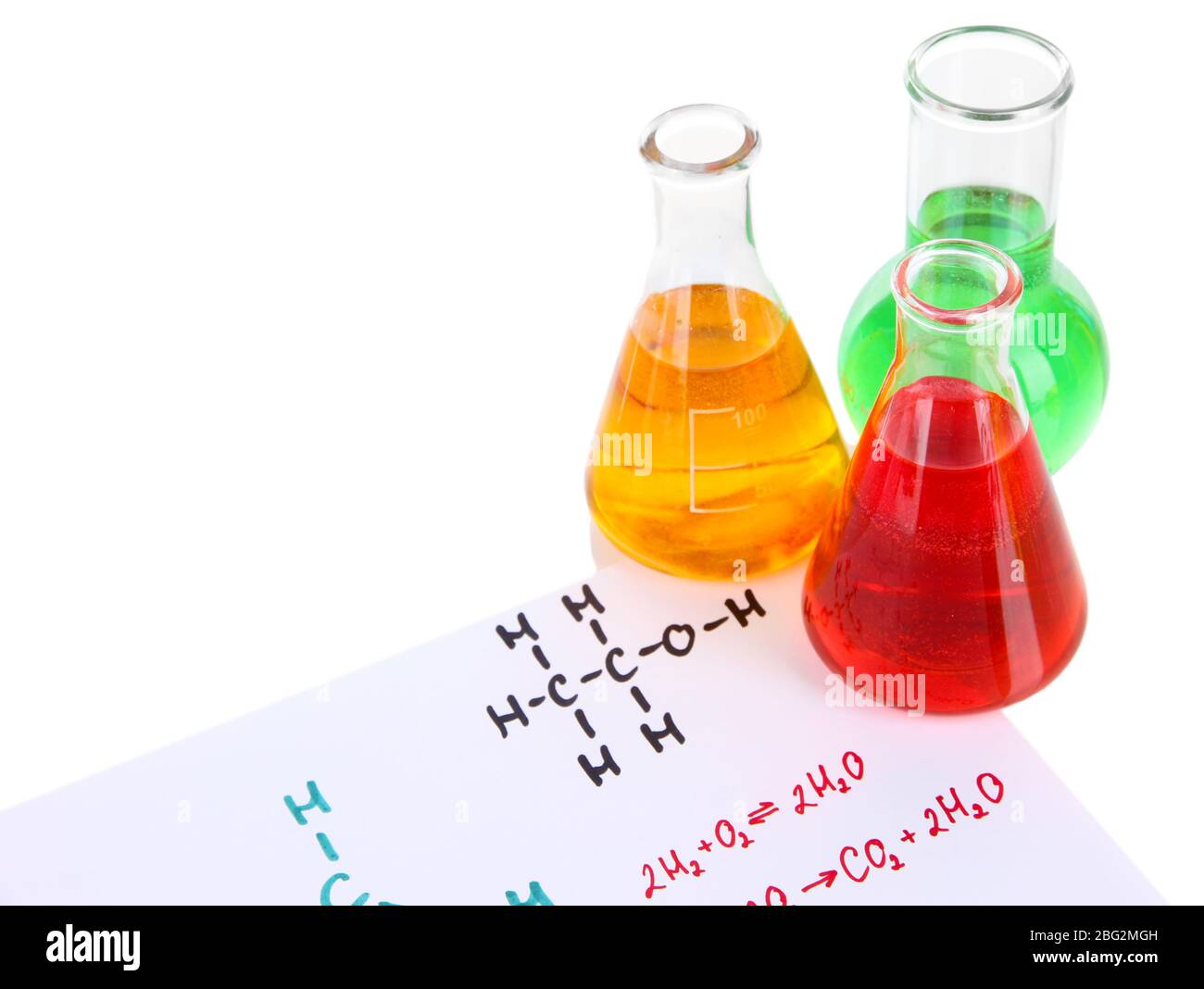 Test tubes with colorful liquids and formulas isolated on white Stock ...