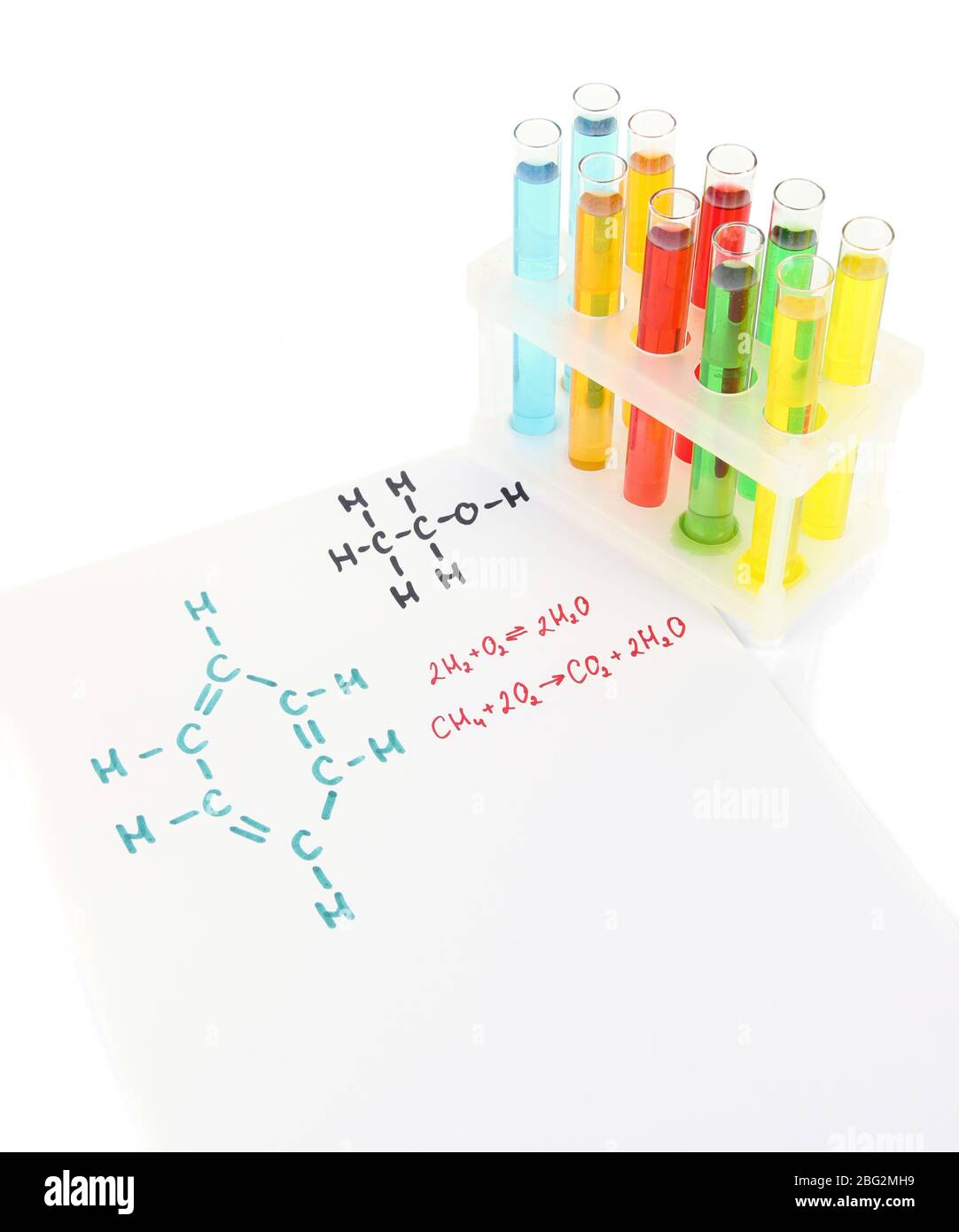 Test tubes with colorful liquids and formulas isolated on white Stock ...