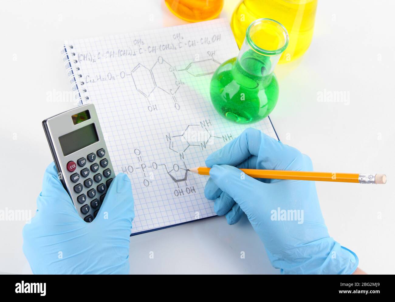Hand scientist writing formulas isolated on white Stock Photo - Alamy