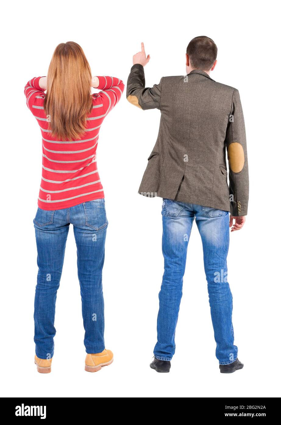 Back view of couple in sweater pointing. Rear view people collection ...