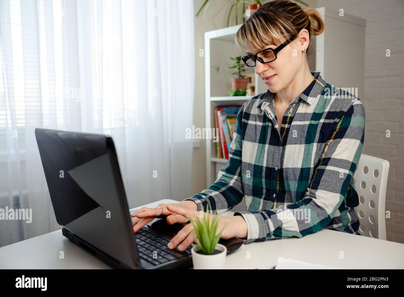 Funny woman working office work remotely from home Stock Photo - Alamy