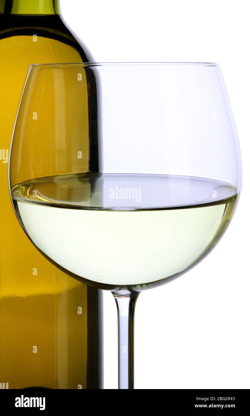 White wine glass and bottle of wine isolated on white Stock Photo - Alamy