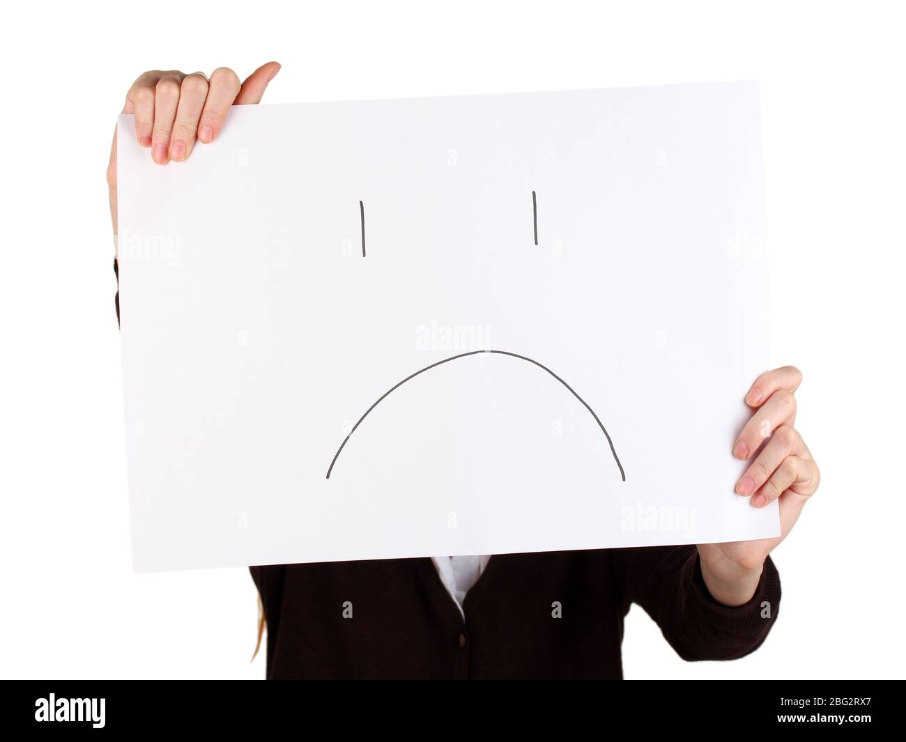 Woman holding paper with sad emoticon, isolated on white Stock Photo ...