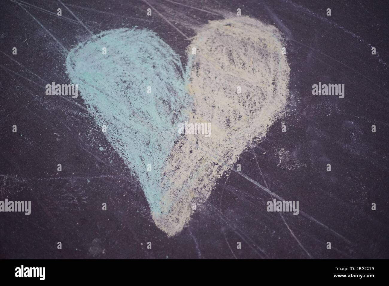 Colorful heart chalk drawing - drawn by a child on a pedestrian ...