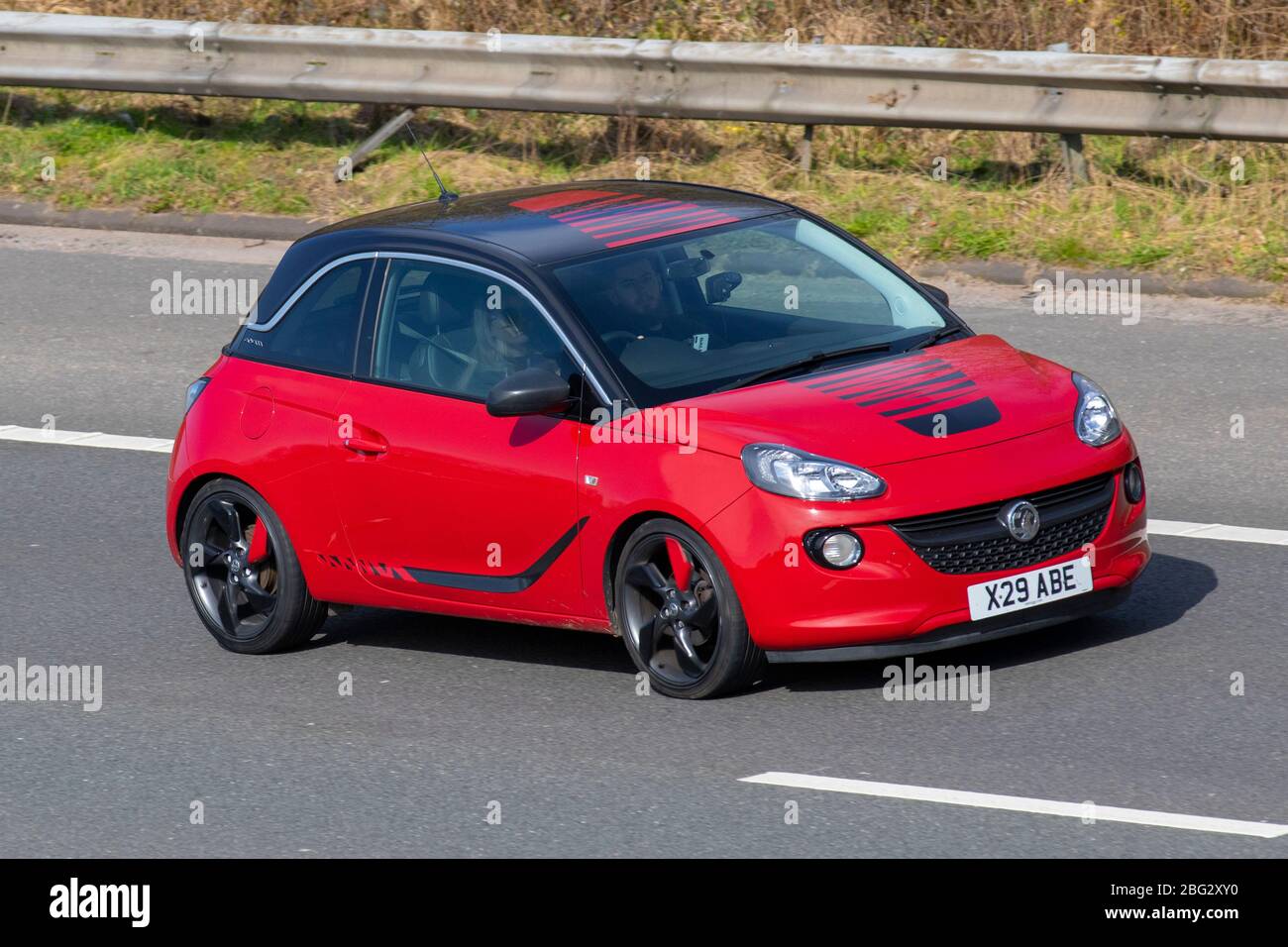 2015 red Vauxhall Adam Slam; Vehicular traffic moving vehicles, driving ...