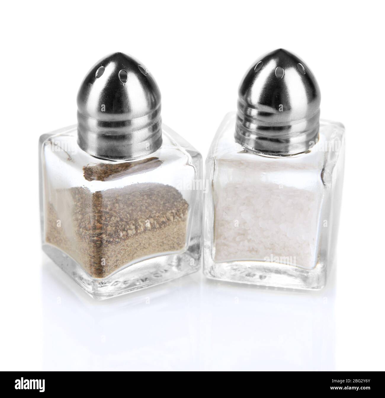 Containers for salt and pepper isolated on white Stock Photo - Alamy