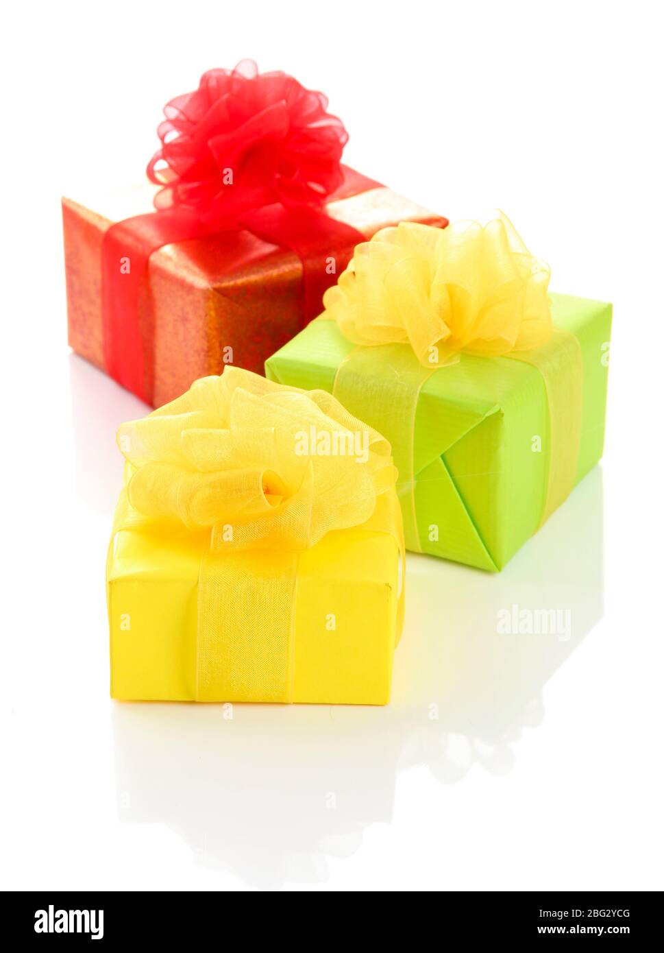 Bright gifts with bows isolated on white Stock Photo - Alamy