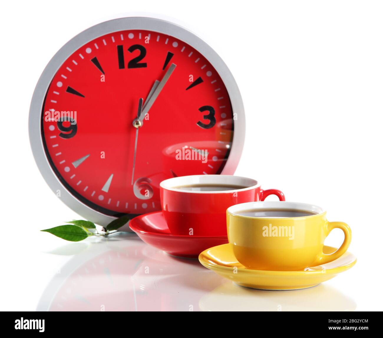 Cups coffee and clock isolated on white Stock Photo - Alamy