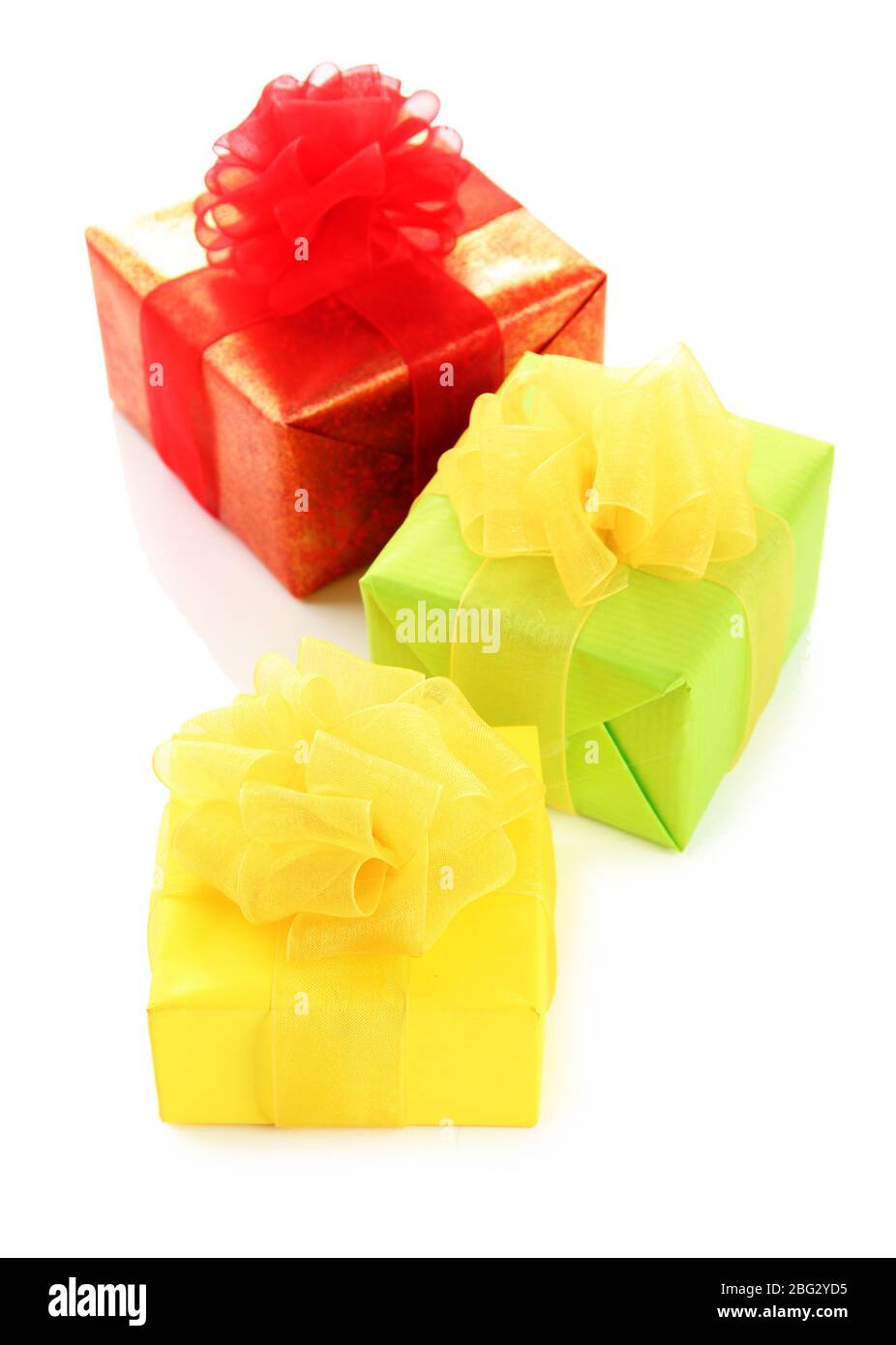 Bright gifts with bows isolated on white Stock Photo - Alamy