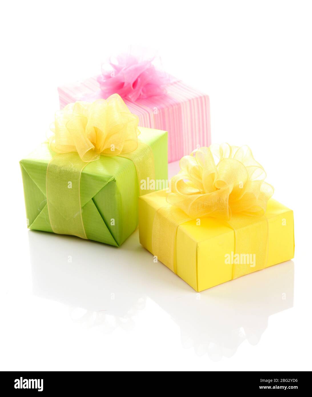 Bright gifts with bows isolated on white Stock Photo - Alamy