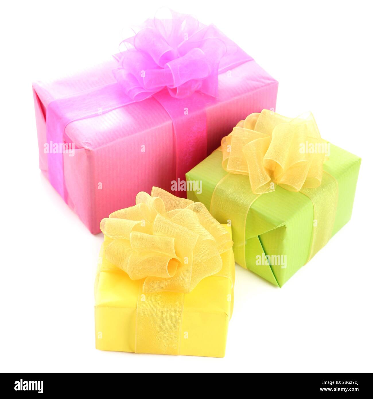 Bright gifts with bows isolated on white Stock Photo - Alamy