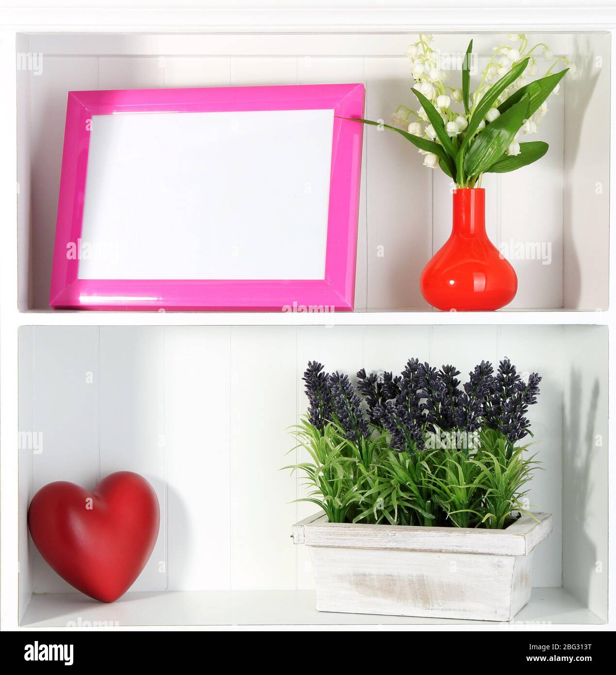Beautiful white shelves with different home related objects Stock Photo ...