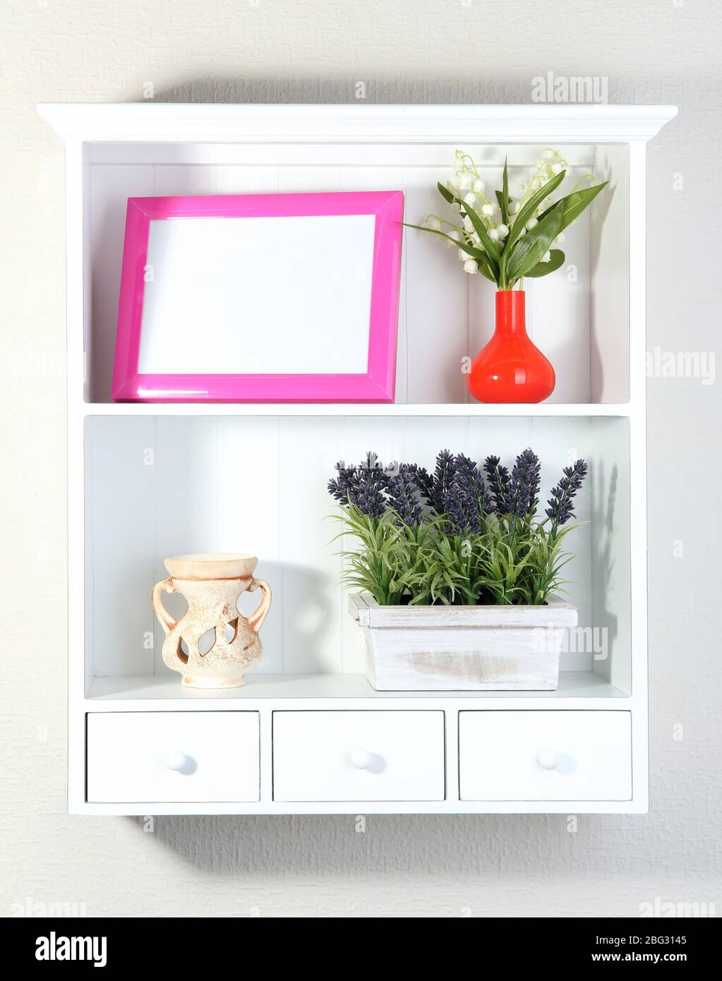 Beautiful white shelves with different home related objects Stock Photo ...