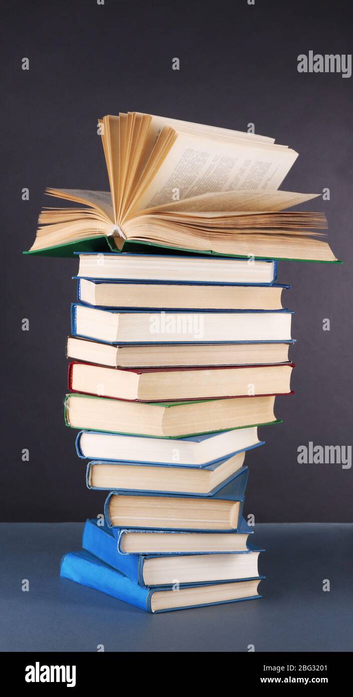 Spiral books on gray background Stock Photo - Alamy