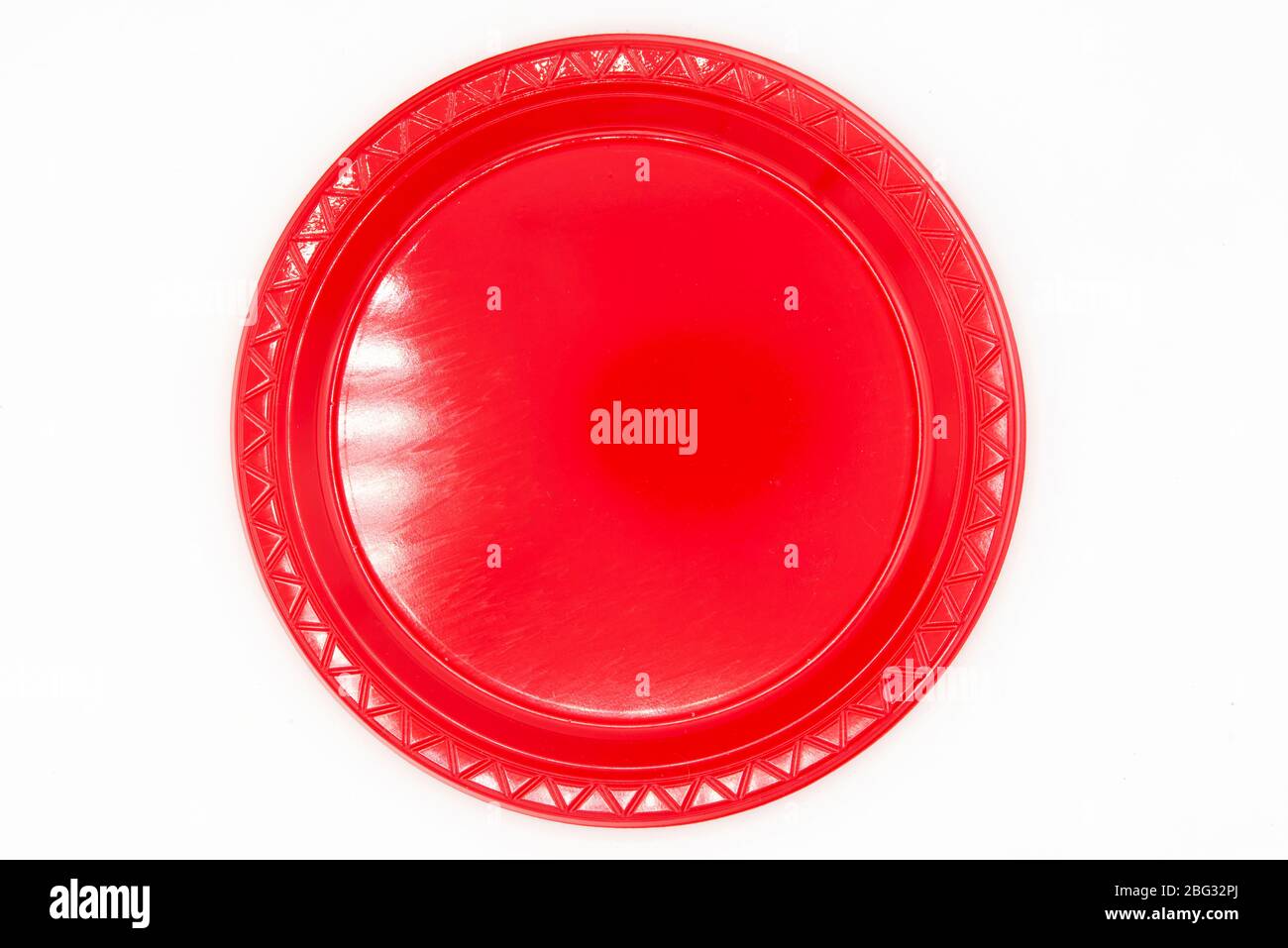 Red cardboard plate on white background Stock Photo - Alamy