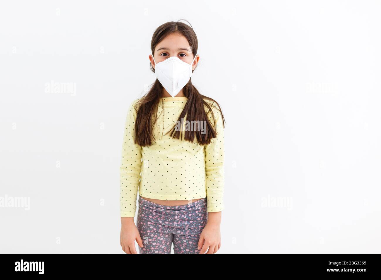 Masked child - protection against influenza virus. Little Caucasian ...