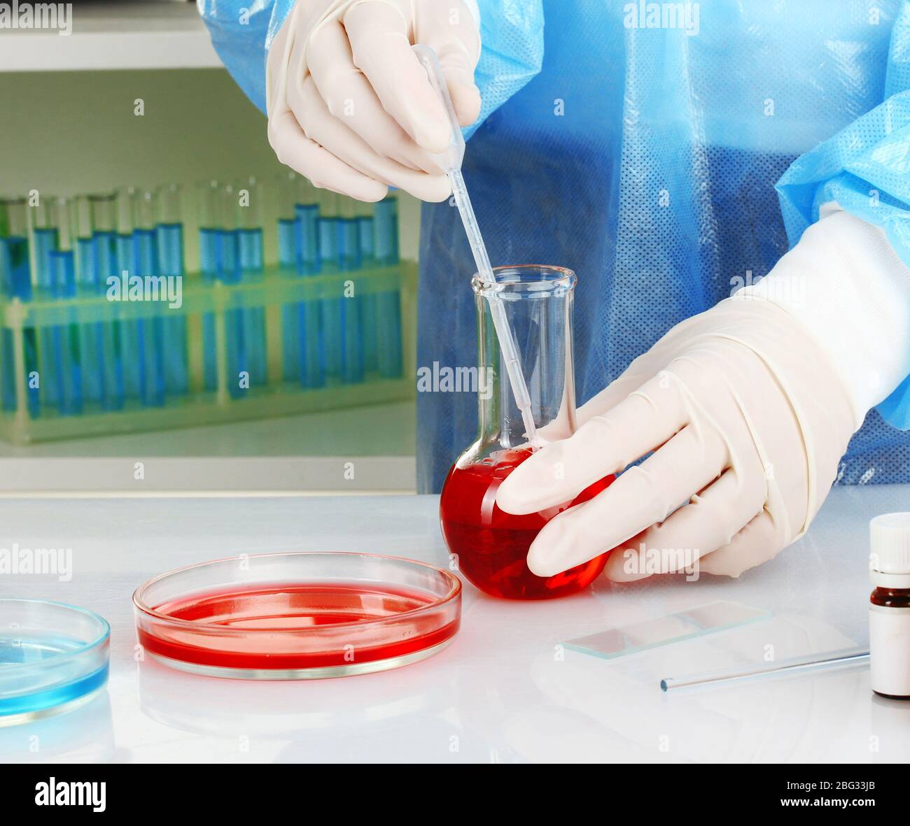 Scientist conducting research in laboratory close up Stock Photo - Alamy