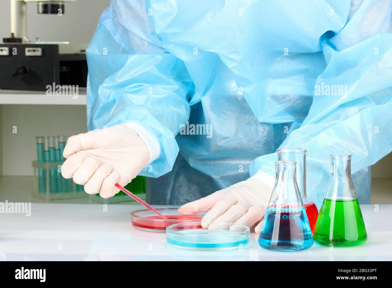Scientist conducting research in laboratory close up Stock Photo - Alamy