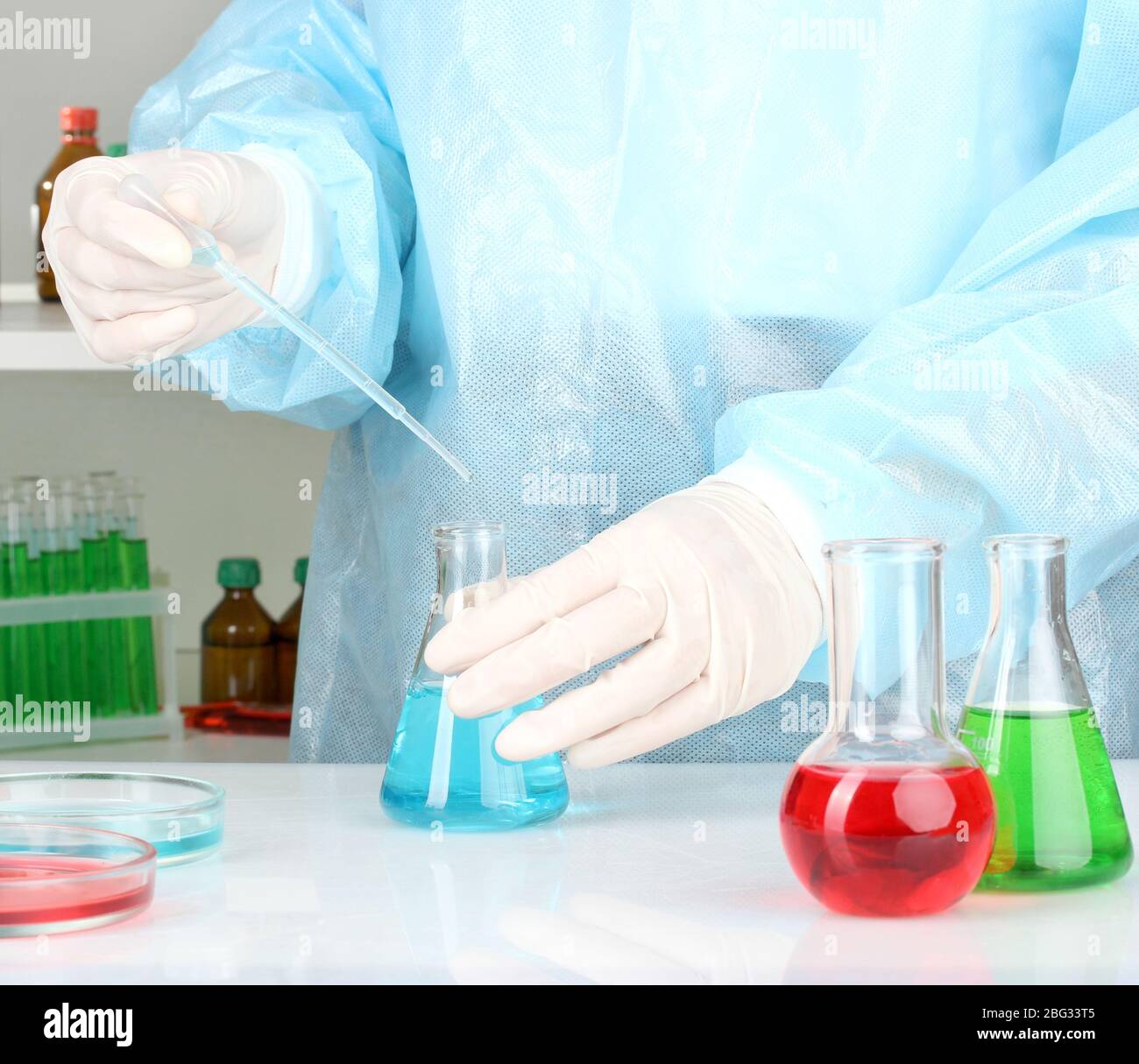 Scientist conducting research in laboratory close up Stock Photo - Alamy