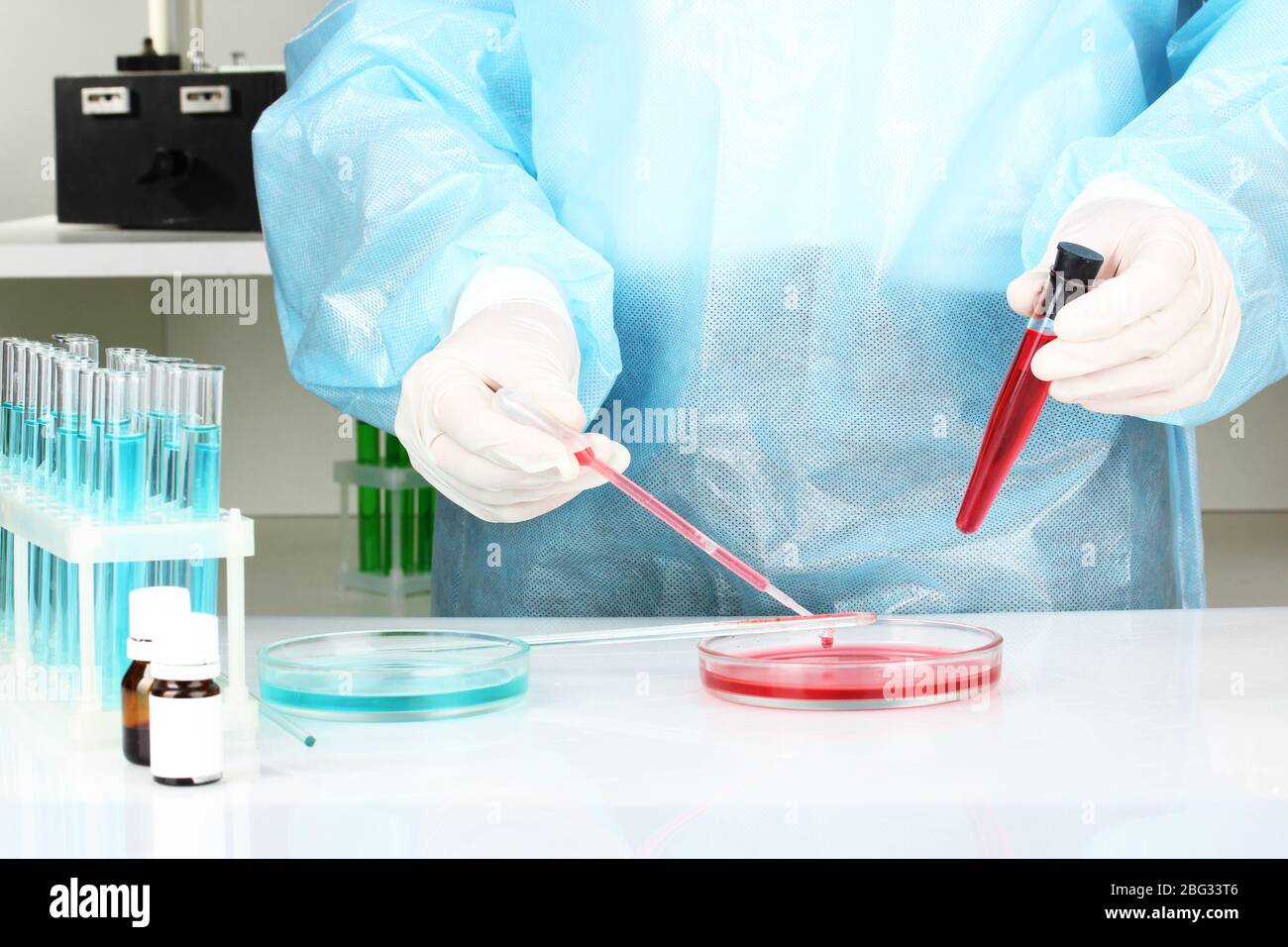 Scientist conducting research in laboratory close up Stock Photo - Alamy