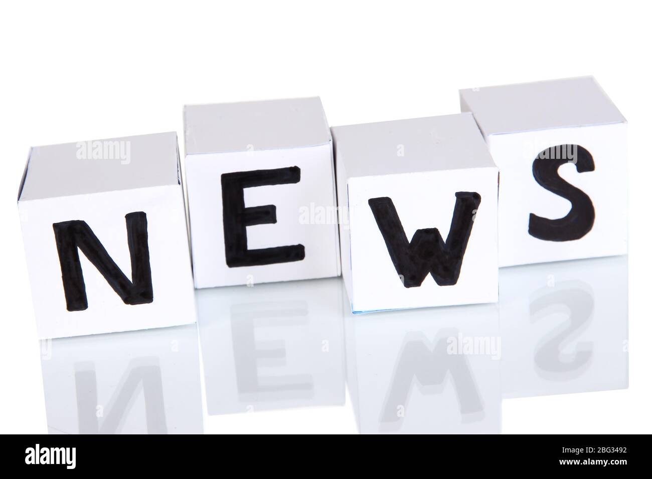 White paper cubes labeled News isolated on white Stock Photo - Alamy
