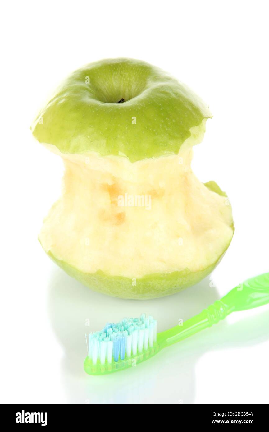 Apple with a toothbrush isolated on white Stock Photo - Alamy