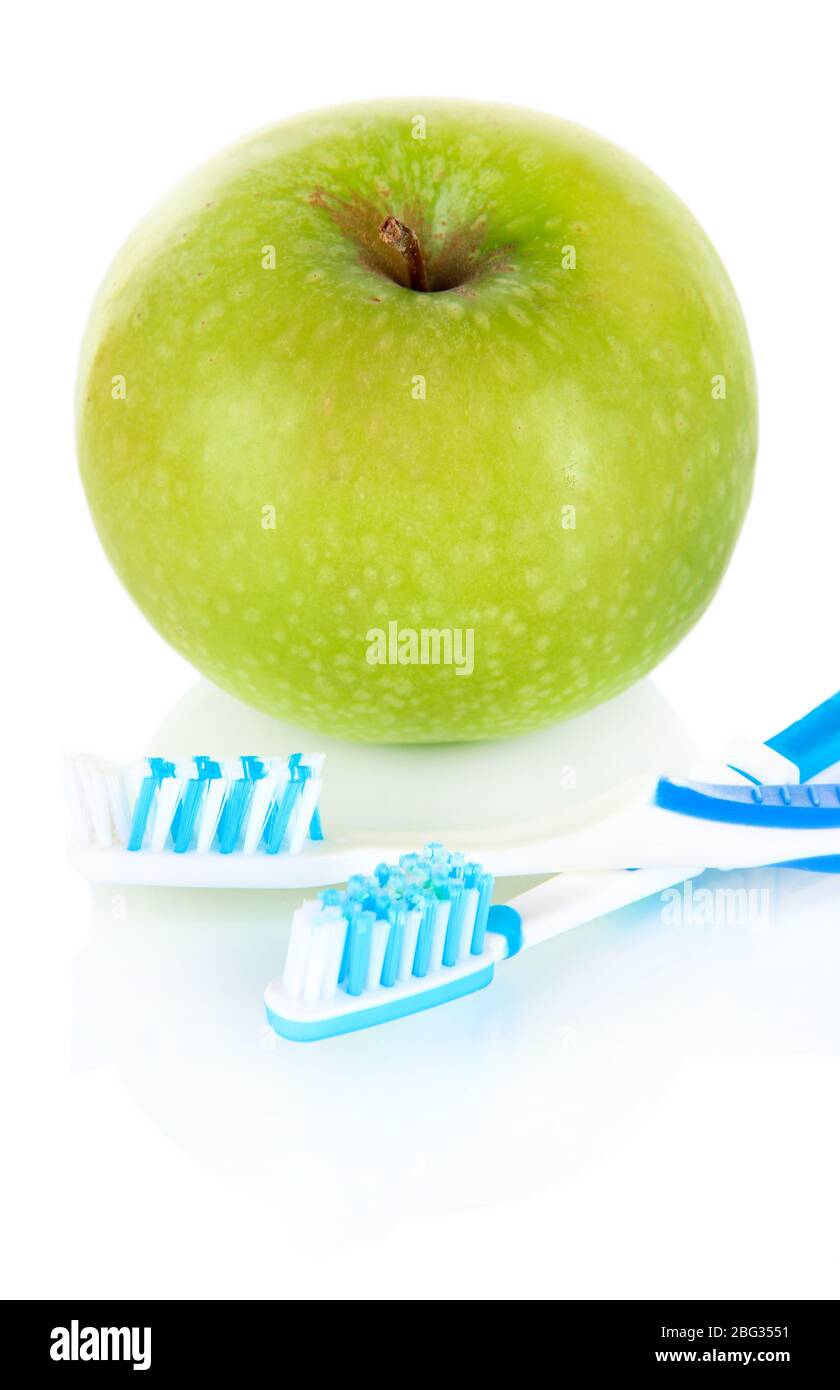 Apple with a toothbrush isolated on white Stock Photo - Alamy