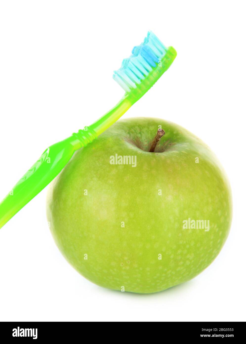Apple with a toothbrush isolated on white Stock Photo - Alamy