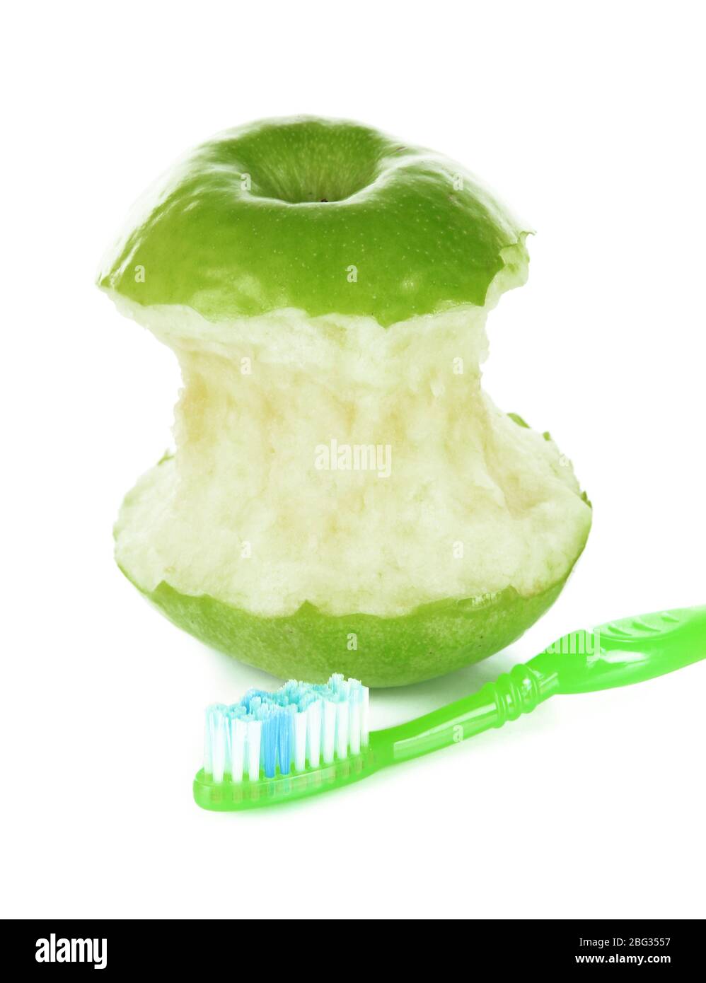 Apple with a toothbrush isolated on white Stock Photo - Alamy