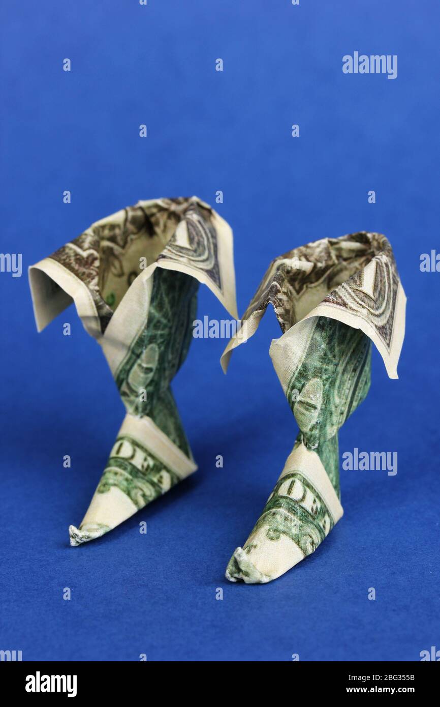 Folded boots hi-res stock photography and images - Alamy