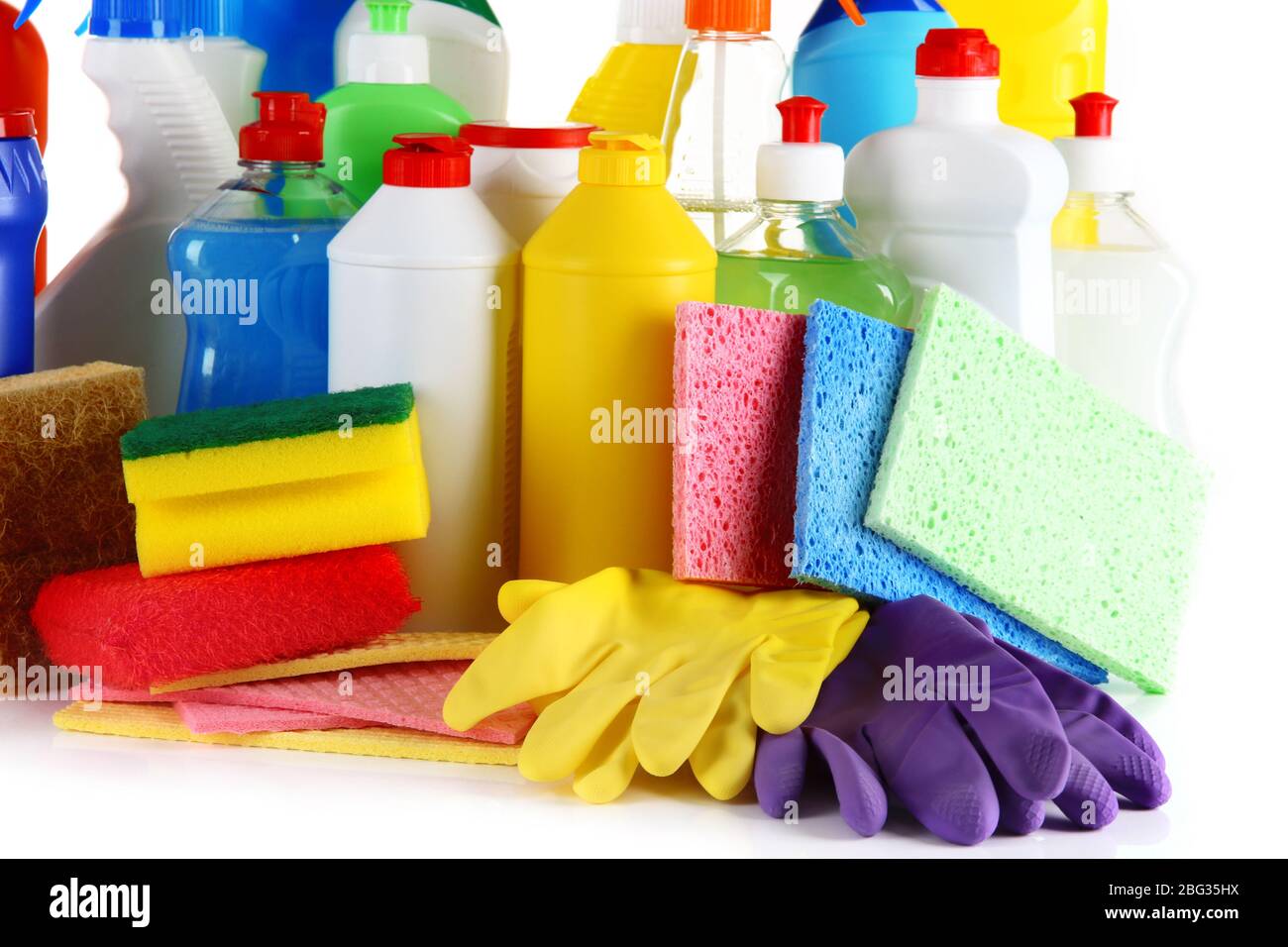 Different kinds of house cleaners and colorful sponges, gloves isolated ...