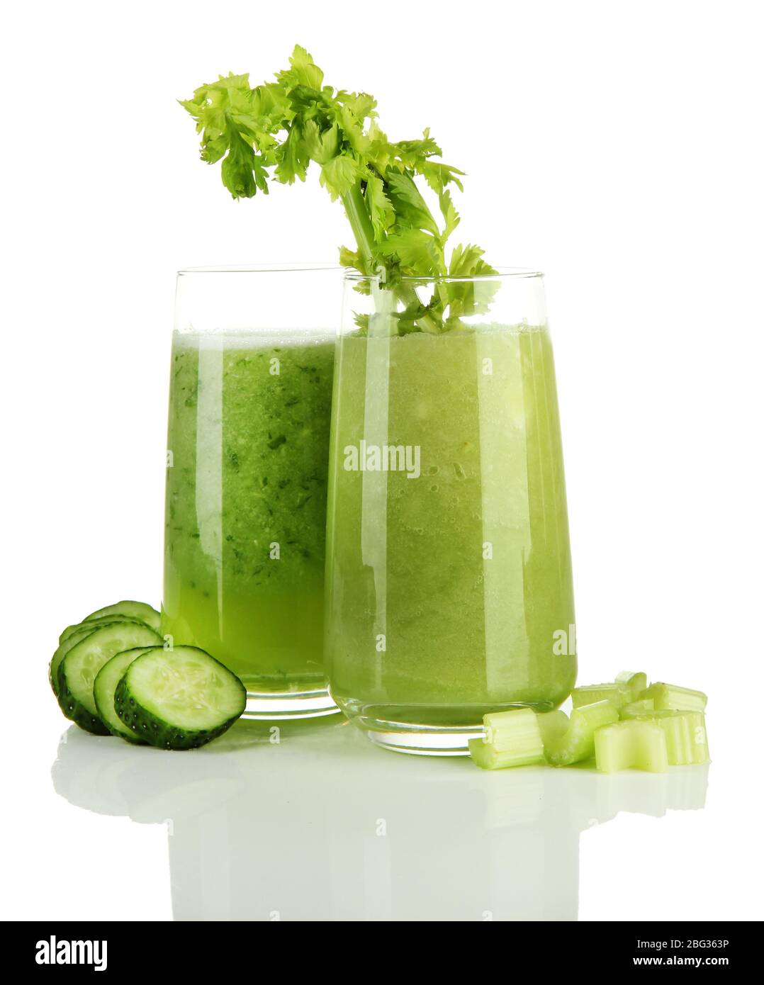 Glasses of green vegetable juice, isolated on white Stock Photo - Alamy