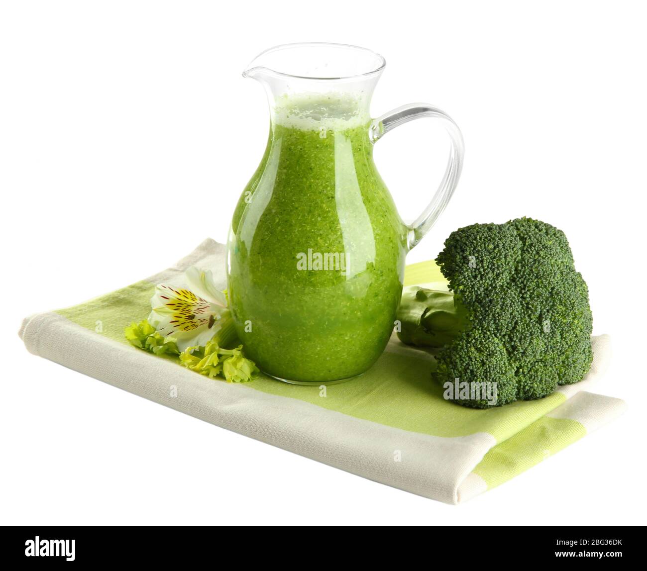 Glass pitcher of green vegetable juice isolated on white Stock Photo ...