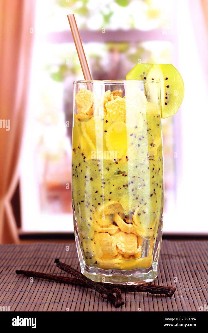 Delicious fruit smoothie on window background Stock Photo - Alamy