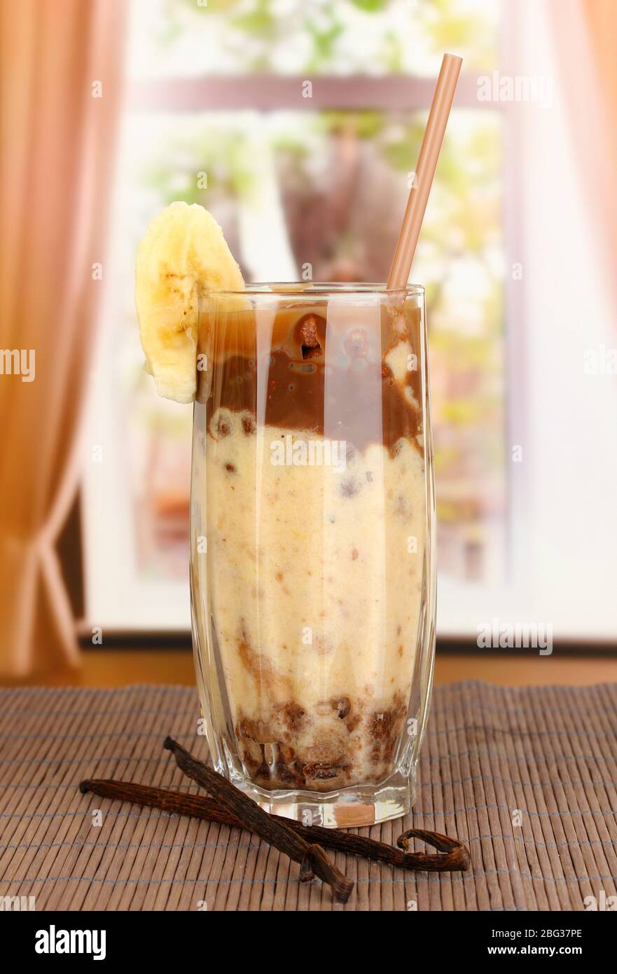 Delicious fruit smoothie on window background Stock Photo - Alamy
