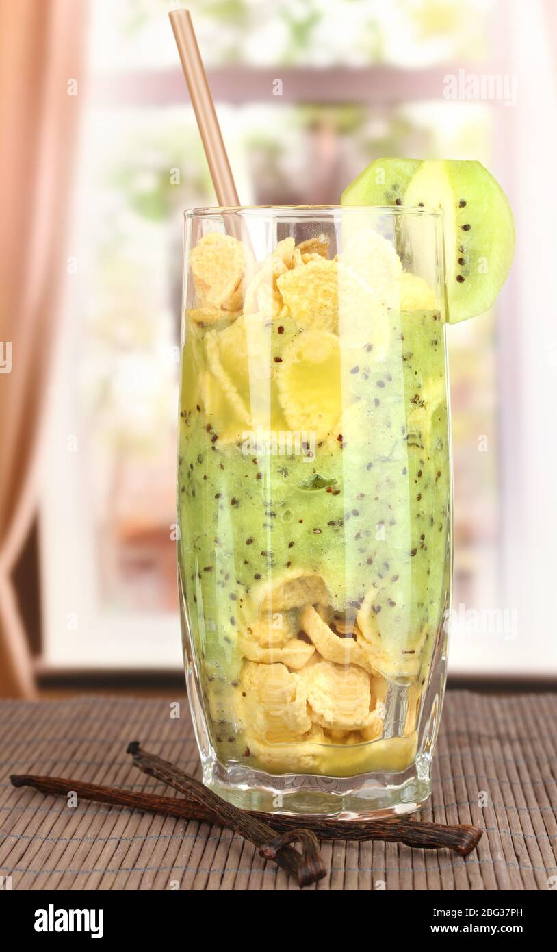 Delicious fruit smoothie on window background Stock Photo - Alamy