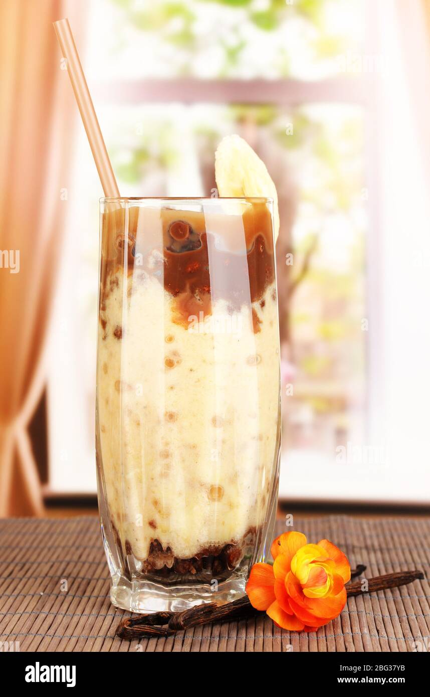 Delicious fruit smoothie on window background Stock Photo - Alamy