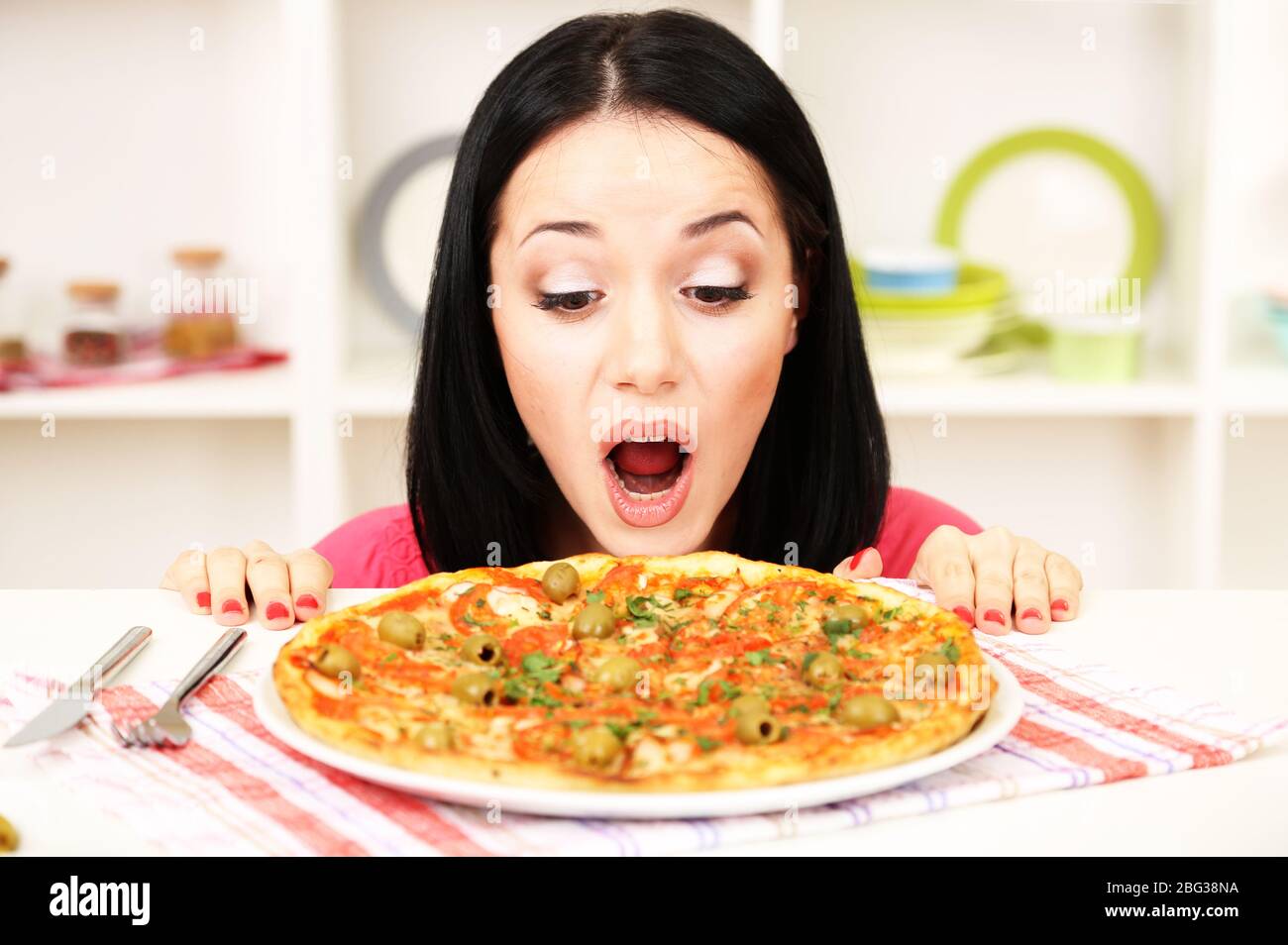 Beautiful Girl Wants To Eat Delicious Pizza On Kitchen Background Stock 1214