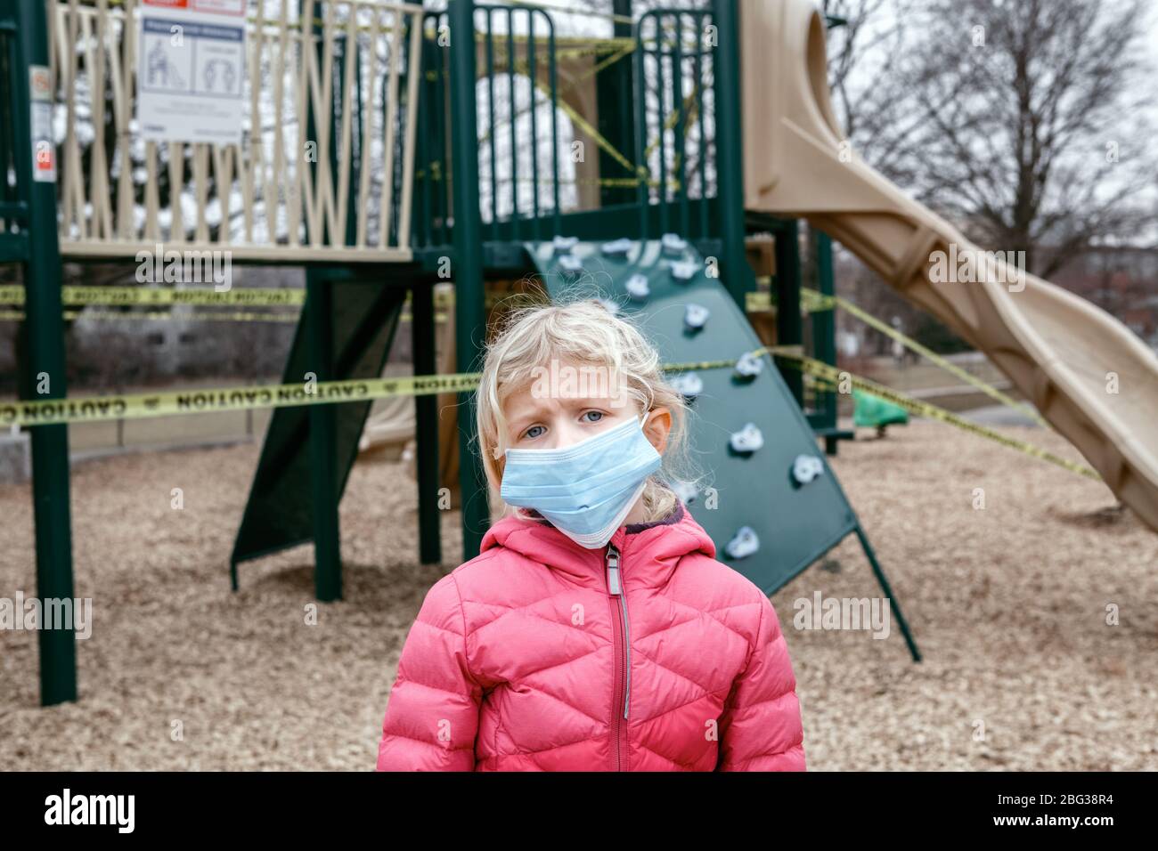 Girl wear mask play playground hi-res stock photography and images - Alamy