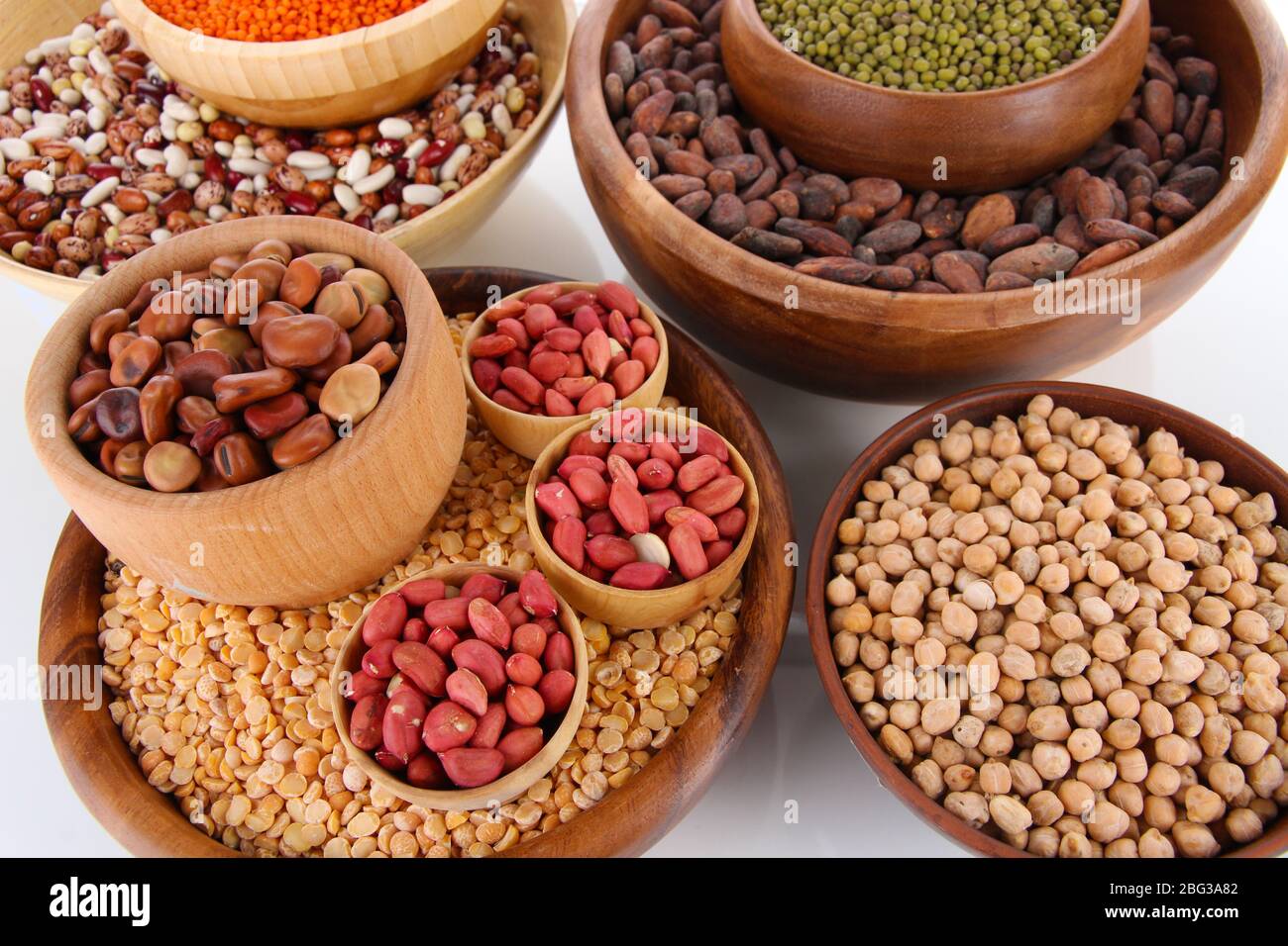 Different kinds of beans in bowls close-up Stock Photo - Alamy