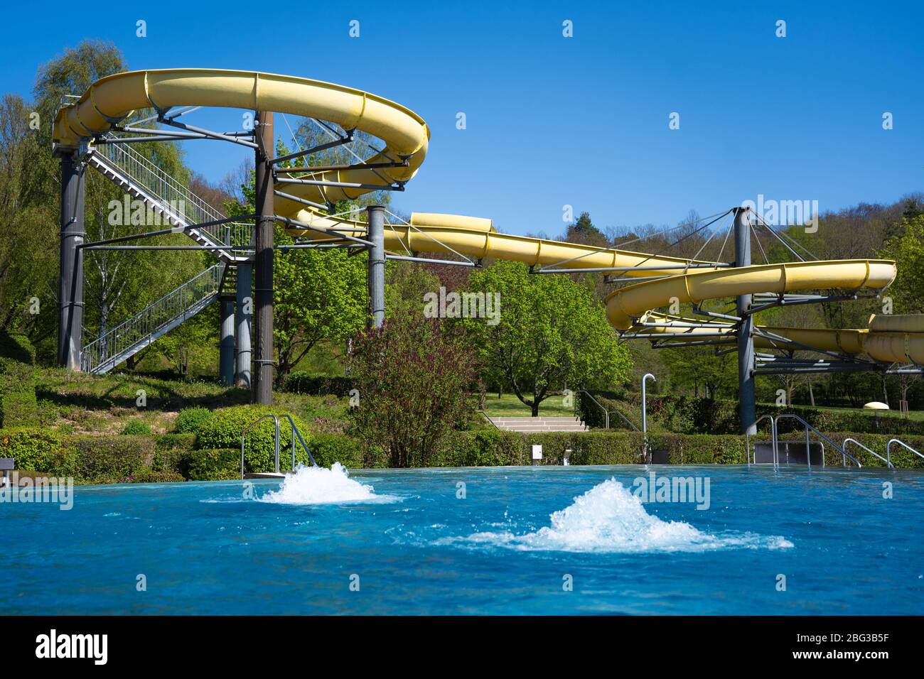 Ebing, Germany. 20th Apr, 2020. The slide of the closed outdoor pool ...