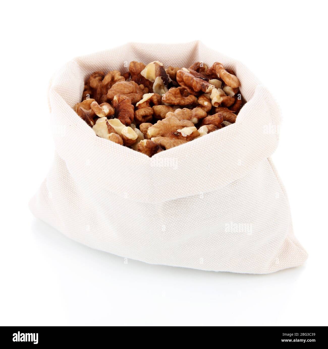 Nuts in sack isolated on white Stock Photo - Alamy