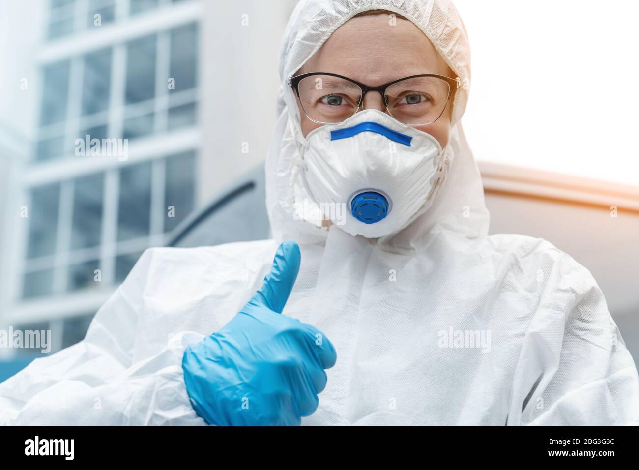 Portrait of tired exhausted female doctor, scientist or nurse wearing ...