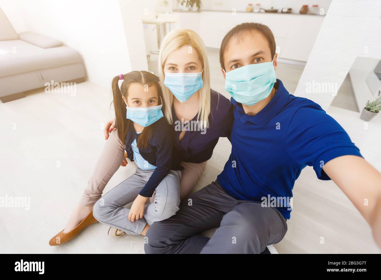 Three people Caucasian family with dad, mom and daughter staying at ...