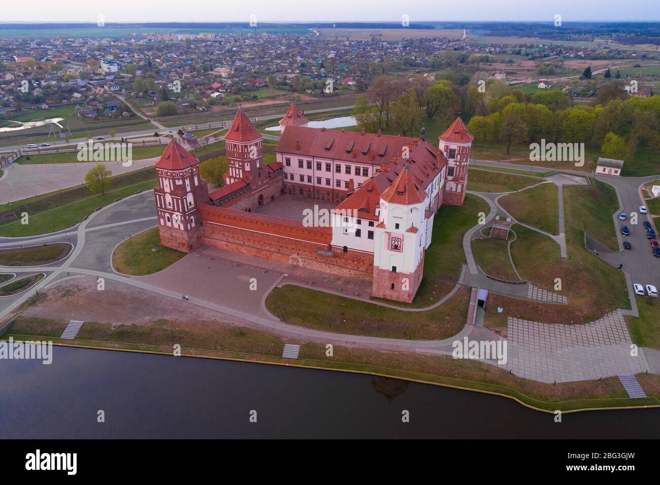 Above the Mir Castle in the evening of April (aerial photography). Mir ...