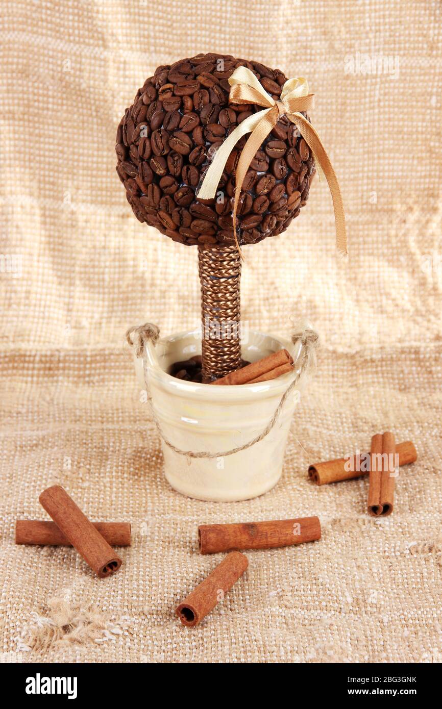 Decorative coffee tree on sacking background Stock Photo - Alamy