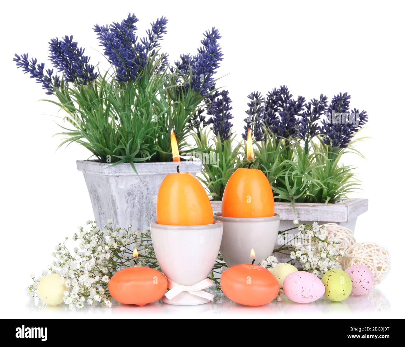 Easter candles with flowers isolated on white Stock Photo - Alamy